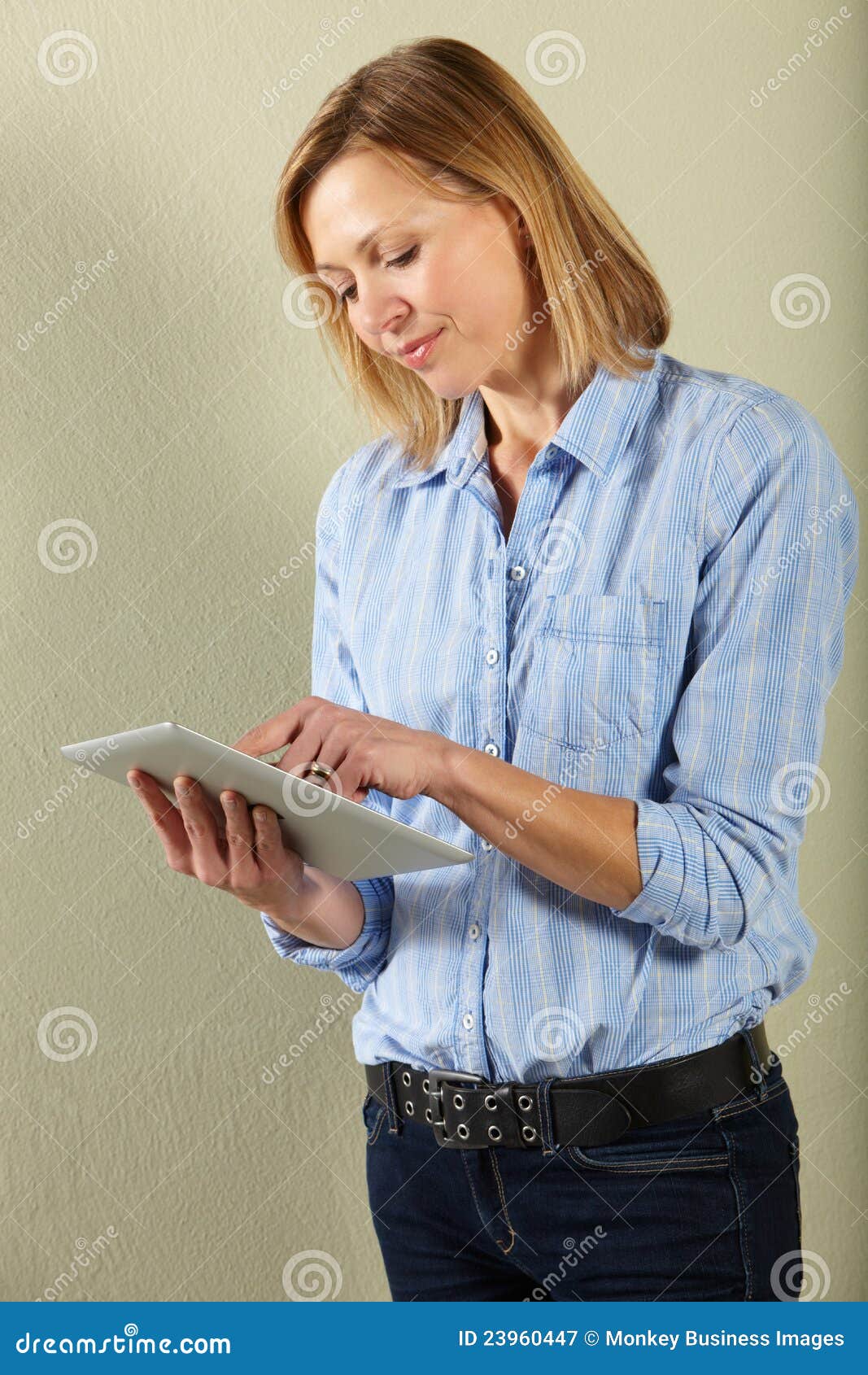 Woman Using Tablet Computer in Studio Stock Image - Image of people ...