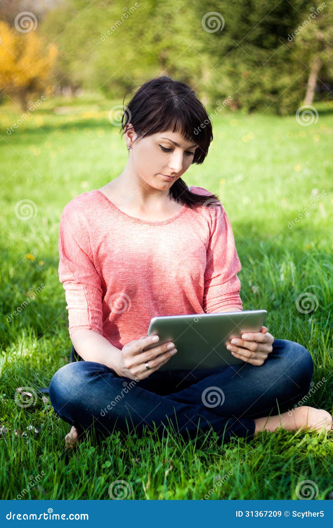 Woman using tablet outdoor stock image. Image of portable - 31367209