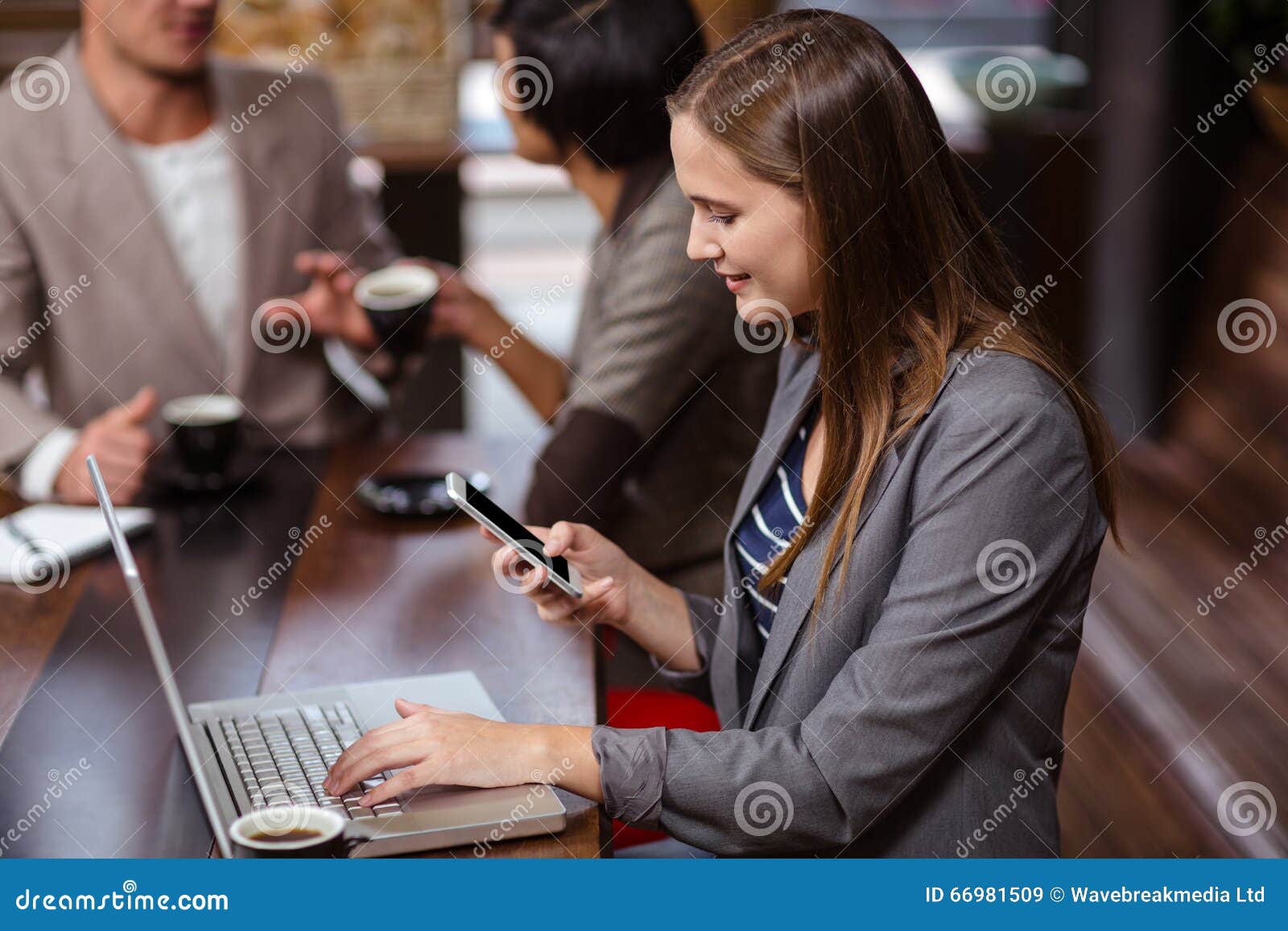 Woman using technology stock image. Image of food, mixedrace - 66981509