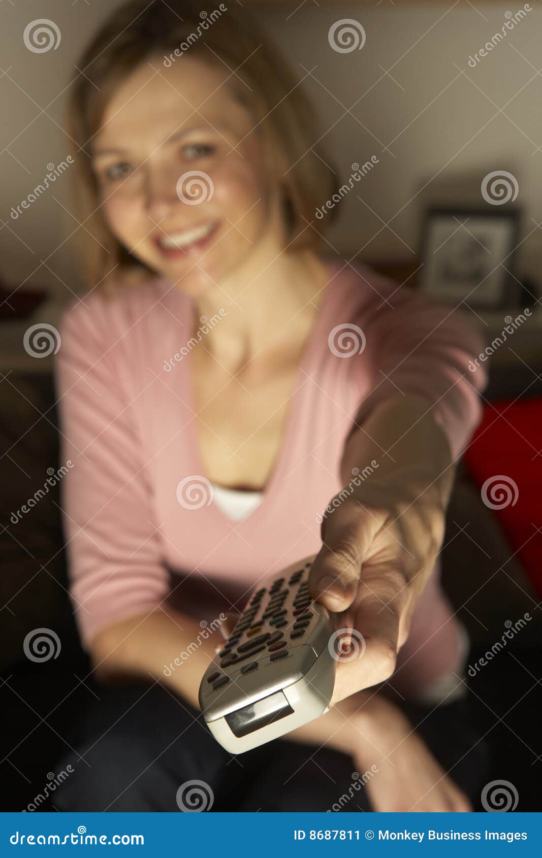 Woman Using Television Remote Control Stock Image - Image of room ...