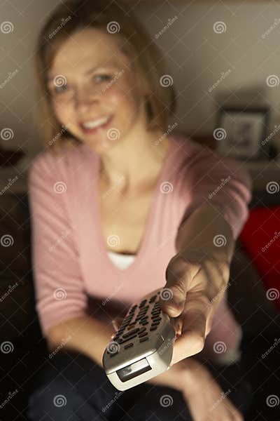 Woman Using Television Remote Control Stock Image - Image of room ...