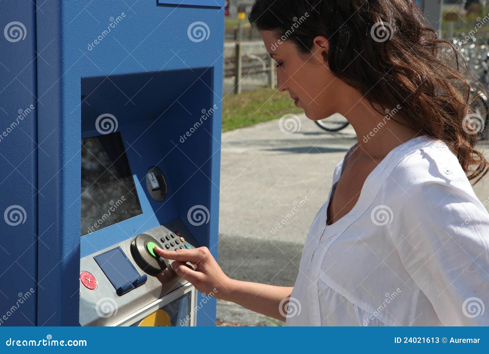Woman Using a Ticket Machine Stock Image - Image of airplane, brunette ...