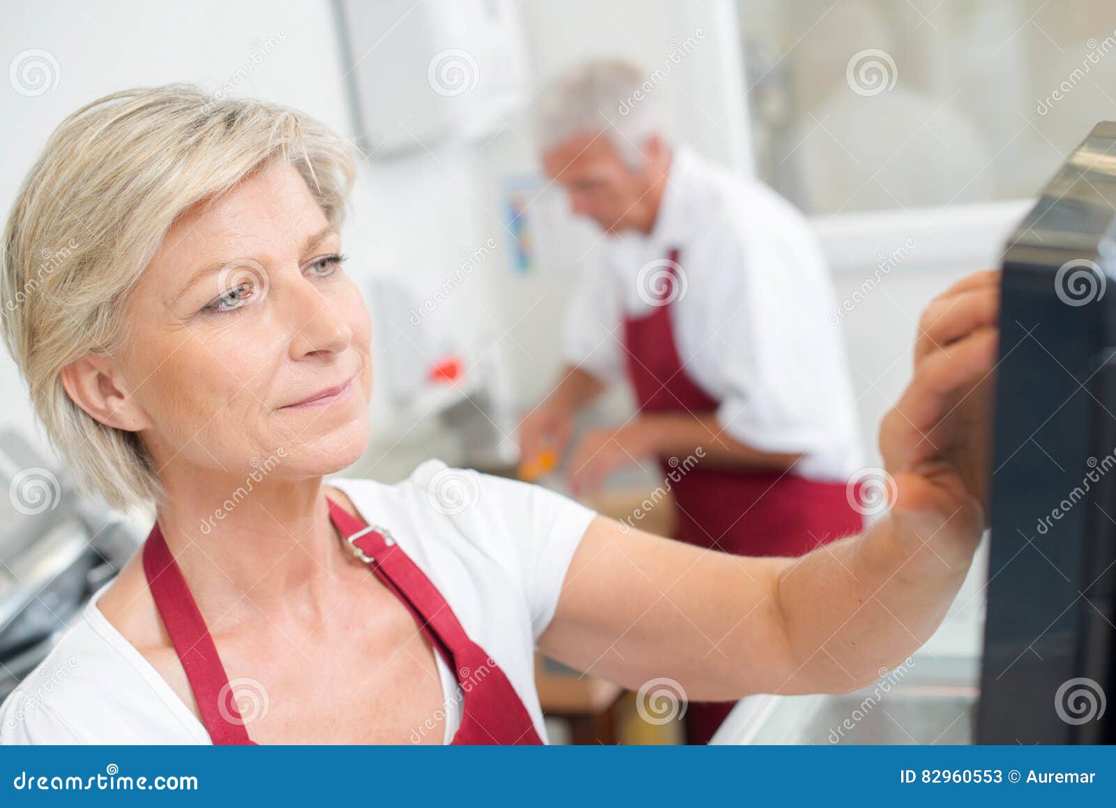 Woman Using Touch Screen Till System Stock Image - Image of horizontal, financial: 82960553