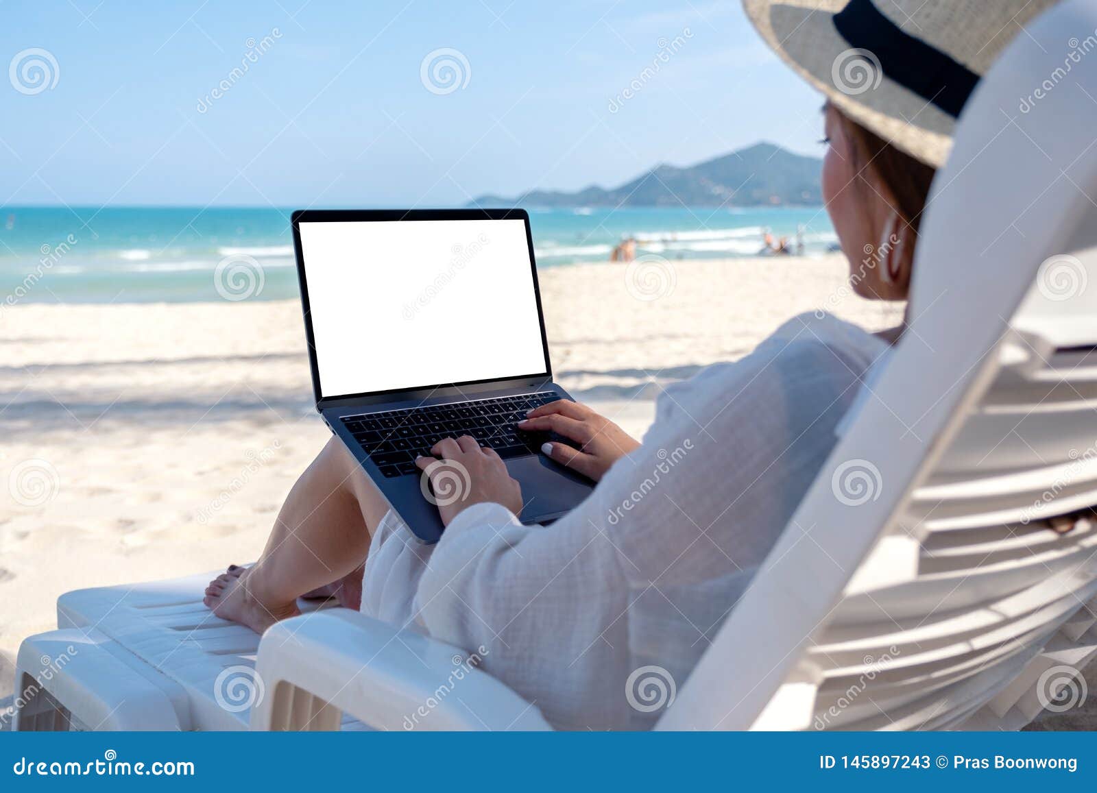 A Woman Using and Typing on Laptop Computer with Blank Desktop Screen ...