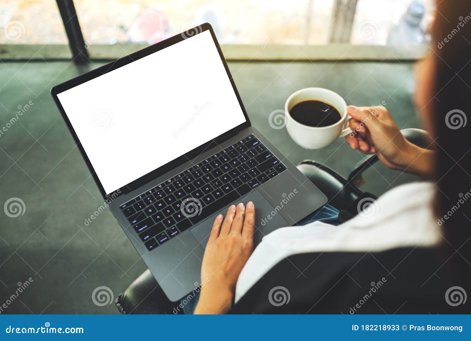 A Woman Using and Typing on Laptop Computer with Blank White Desktop ...