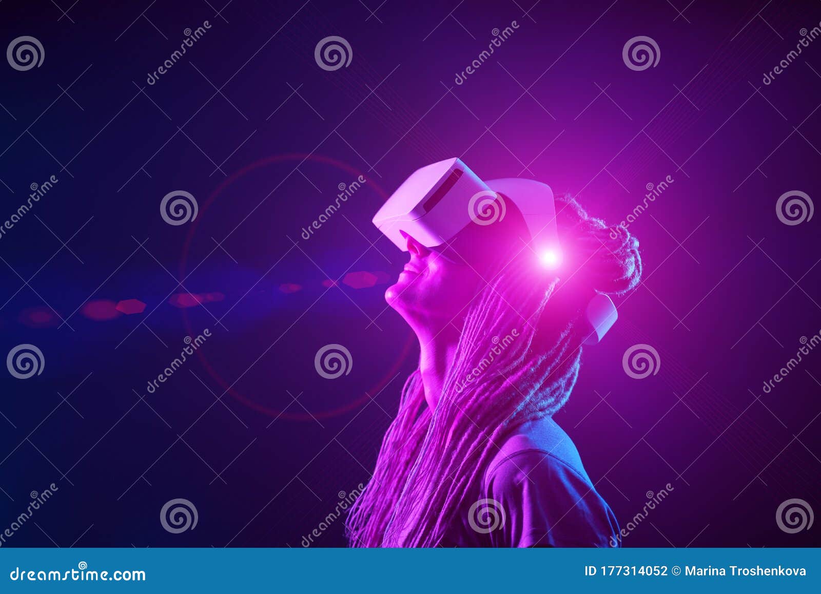 Woman is Using Virtual Reality Headset. Neon Light Studio Portrait ...
