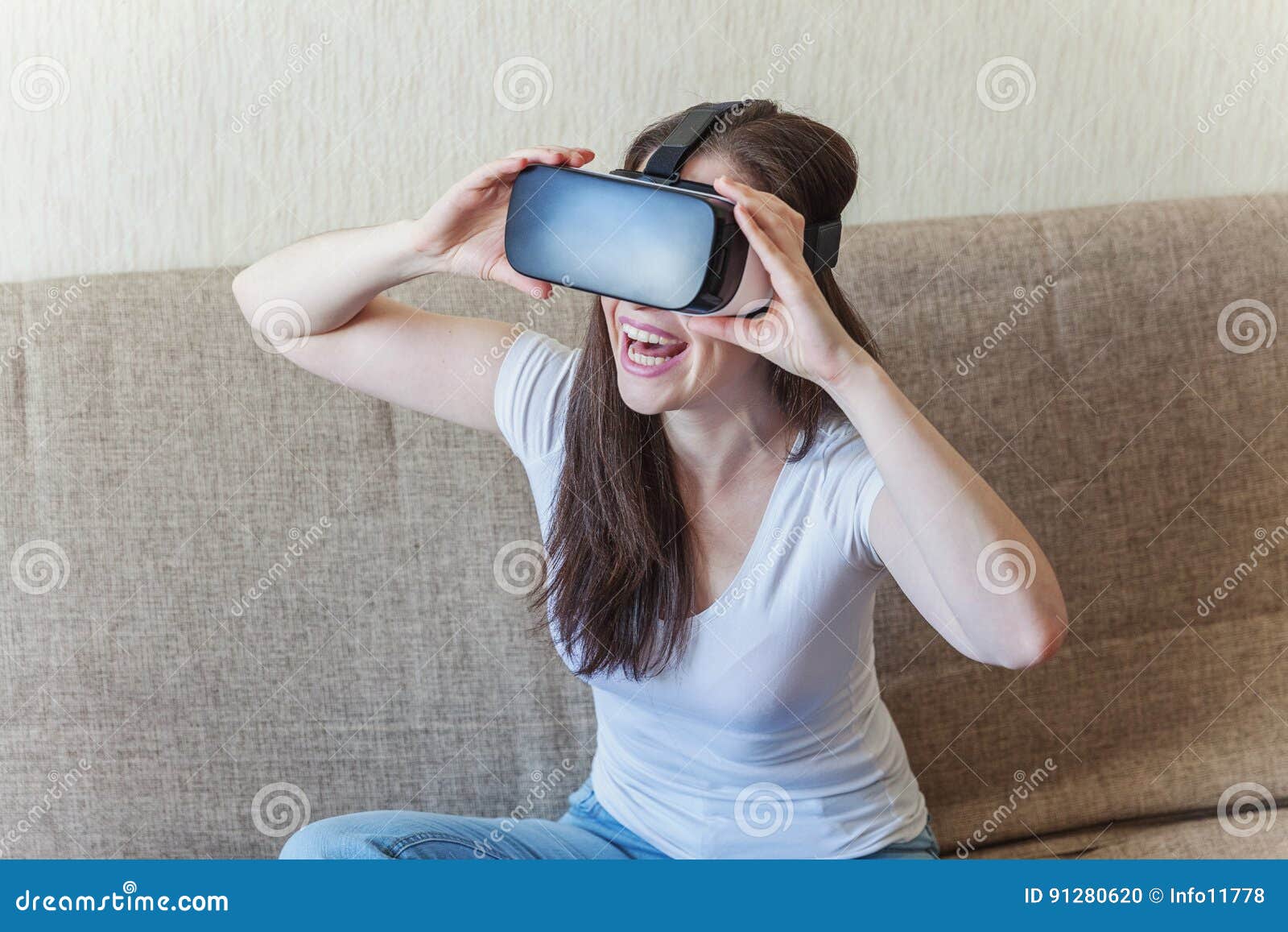Woman using VR headset stock photo. Image of adult, amazement - 91280620