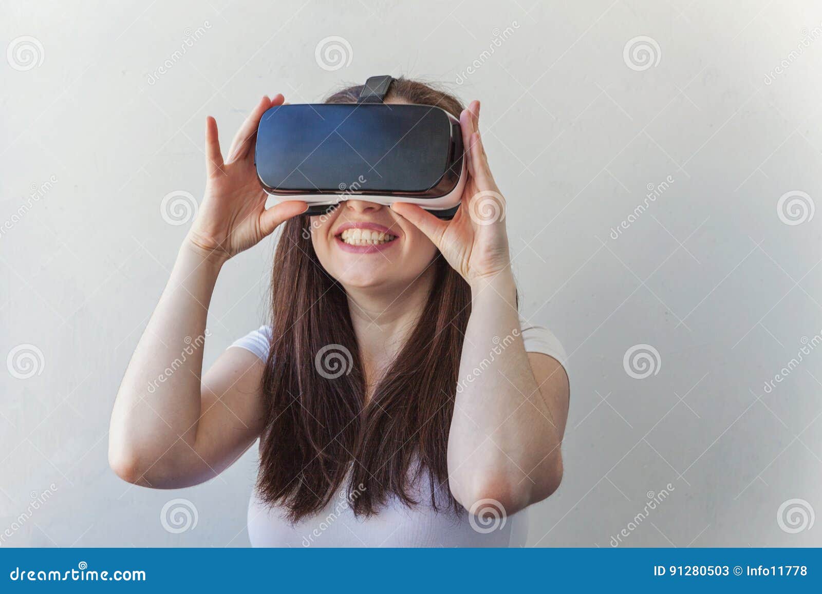 Woman using VR headset stock image. Image of activity - 91280503