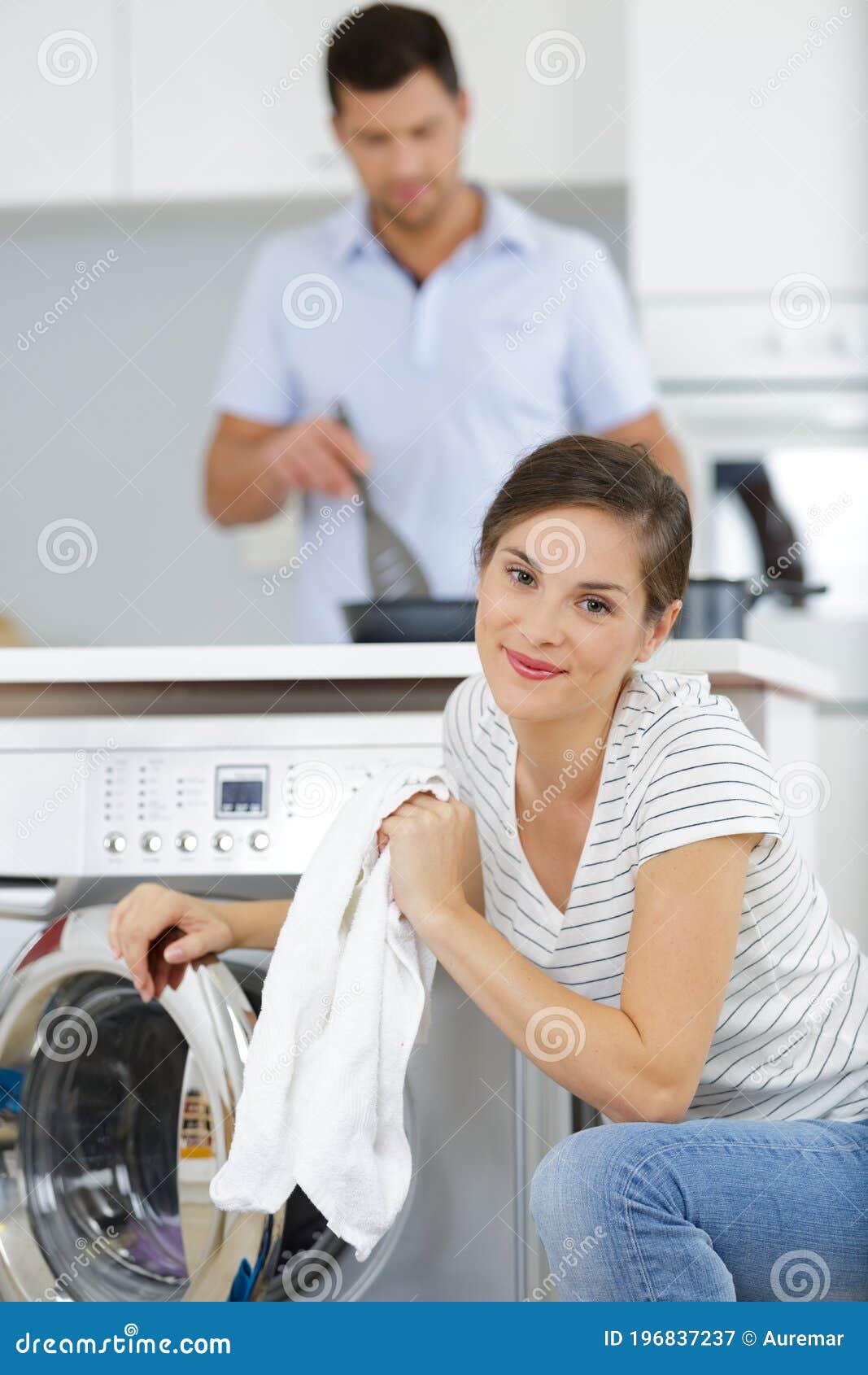 Woman Using Washing Machine at Home Stock Image - Image of loading ...