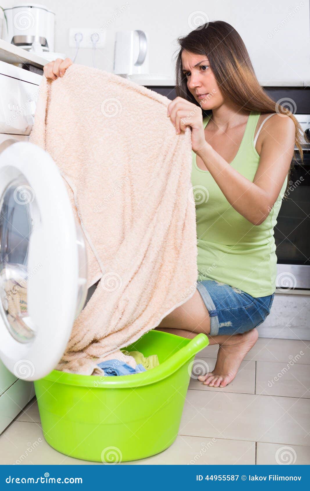 Woman Using Washing Machine Stock Image - Image of clothes, frazzle ...