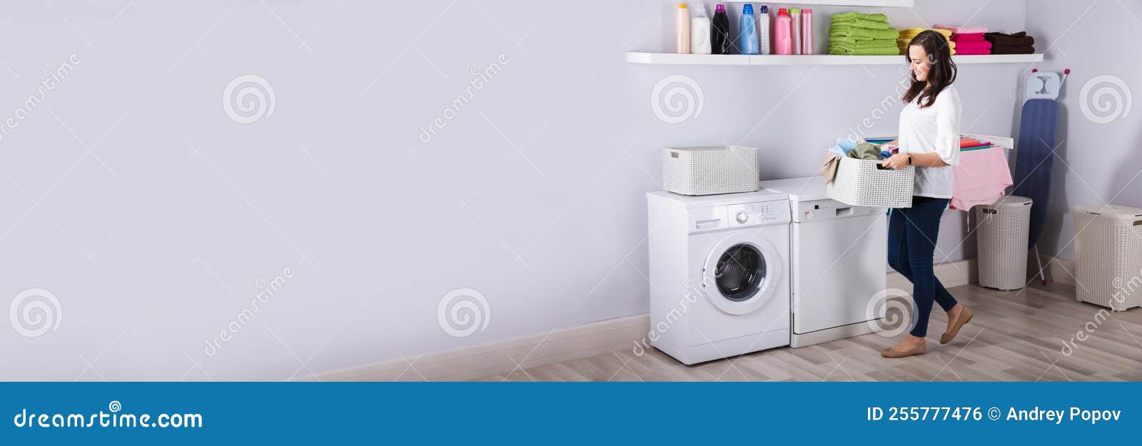Woman Using Washing Machine Stock Photo - Image of room, washing: 255777476