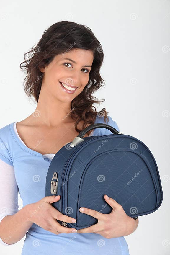Woman with vanity case stock image. Image of smiling - 22727387