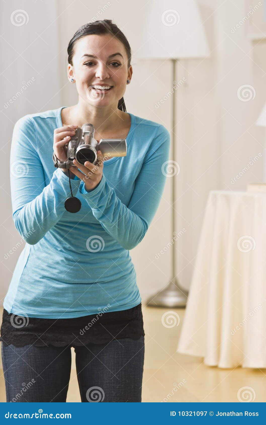 Woman with video camera stock image. Image of caucasian - 10321097