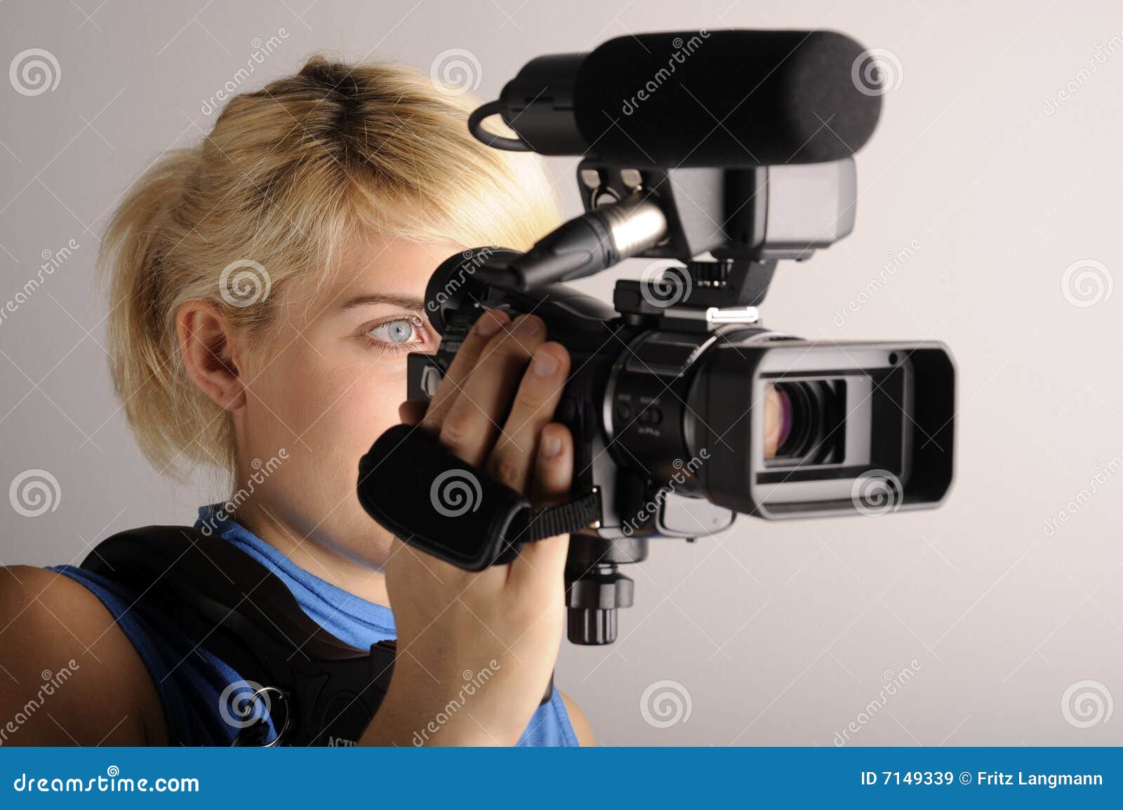 Woman with video camera stock image. Image of film, inside - 7149339