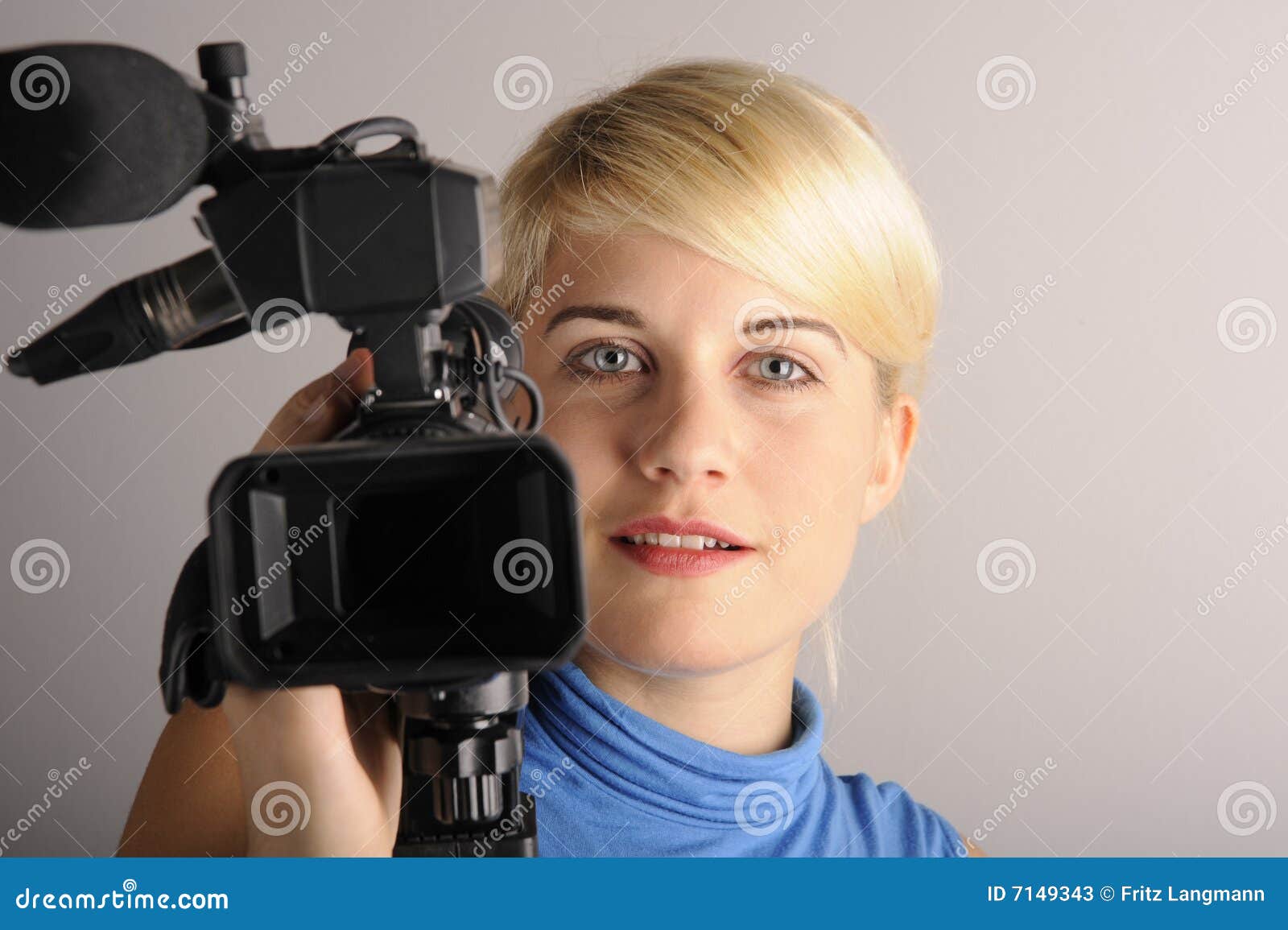 Woman with video camera stock image. Image of camara, indoor - 7149343