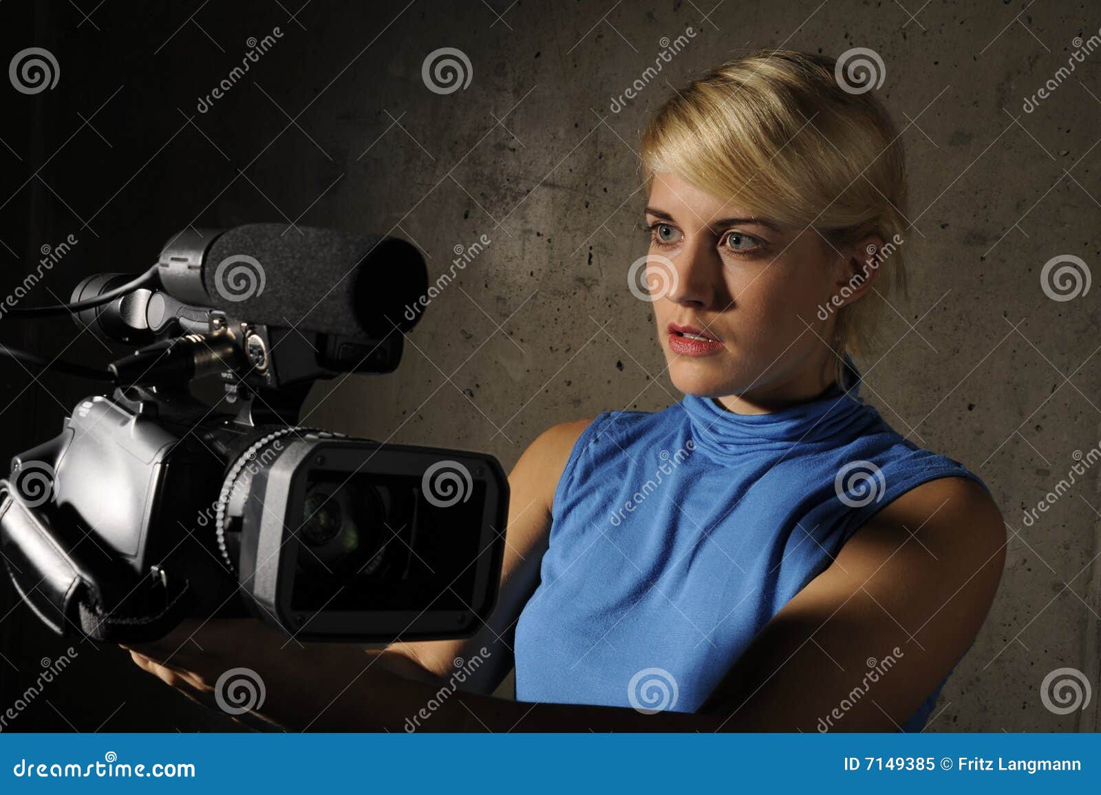 Woman with video camera stock image. Image of camera, easy - 7149385