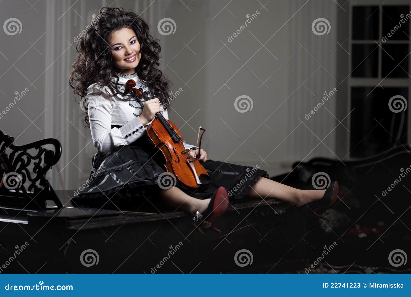 Woman with a violin stock image. Image of concert, background - 22741223