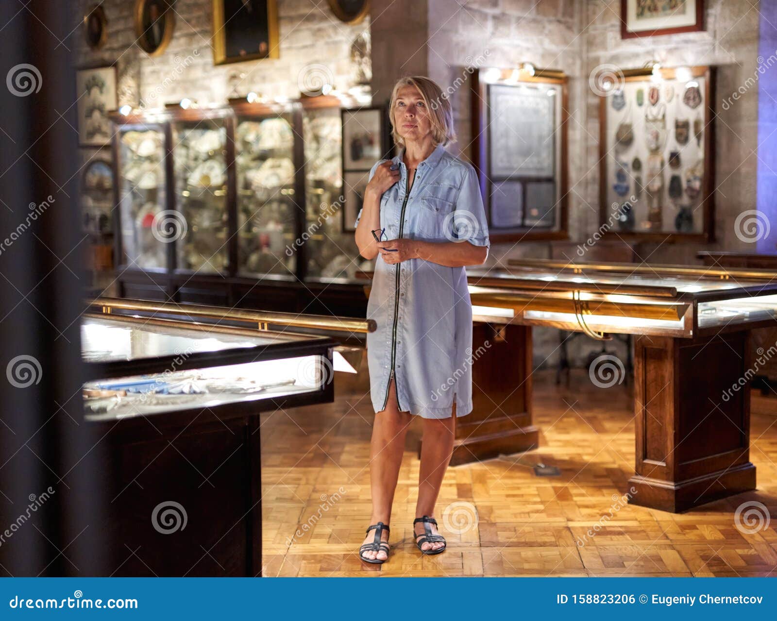 Woman Visitor in Museum Looking at Art Object. Editorial Photo - Image ...