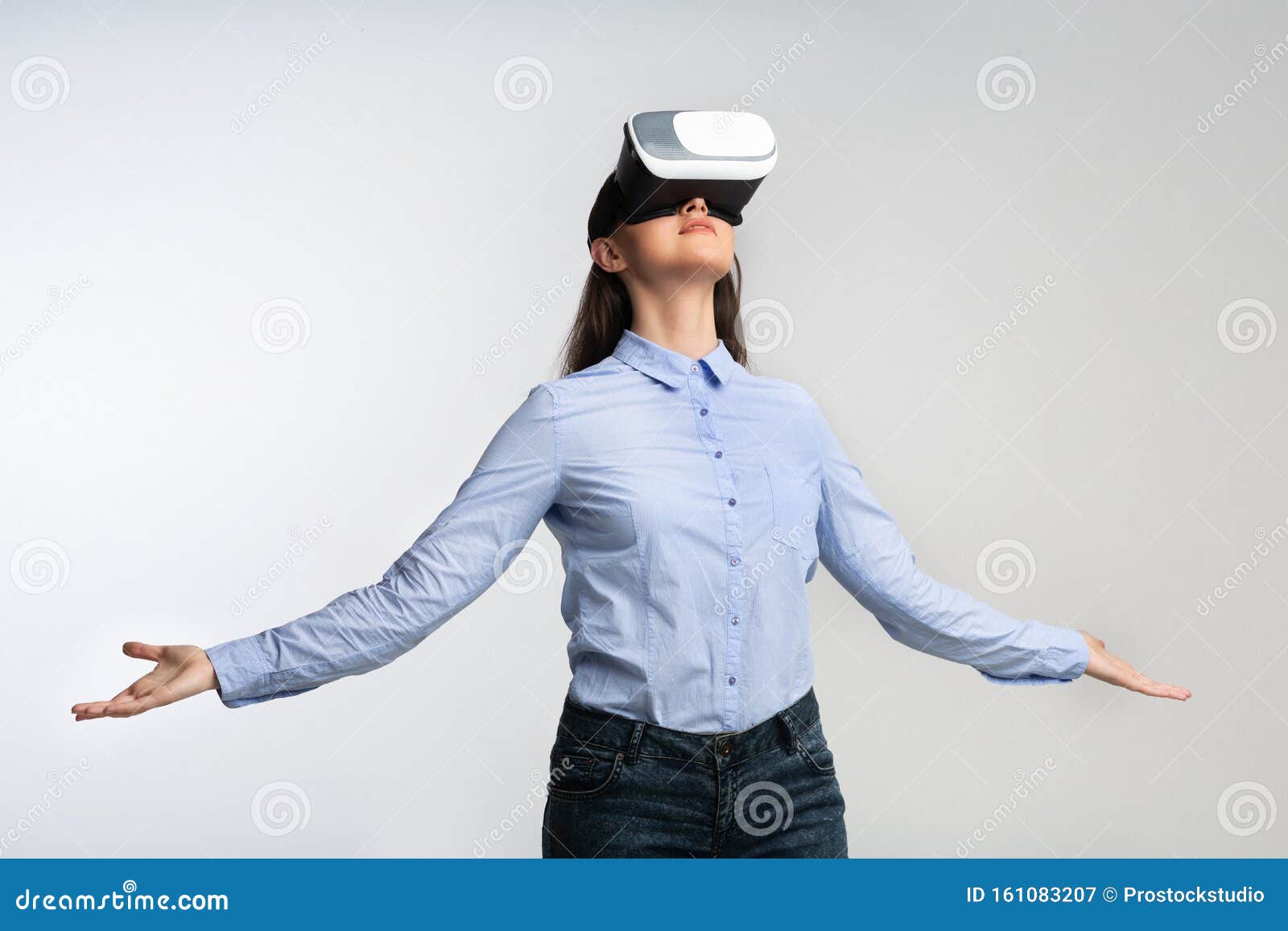 Woman in VR Headset Standing Experiencing Virtual Reality, Gray ...
