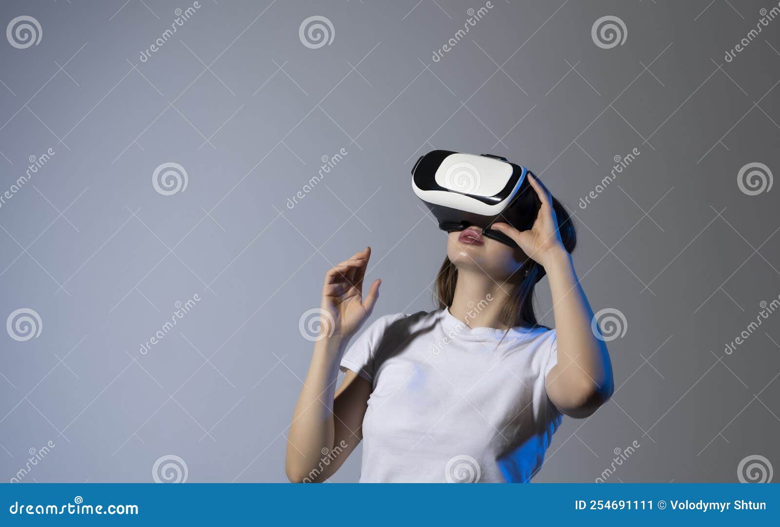 Woman in VR Headset Using Finger To Touch on Imaginary Panel Viewing on ...
