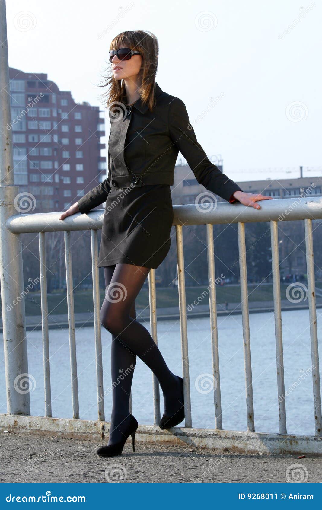Woman Waiting on the Bridge Stock Image - Image of river, female: 9268011