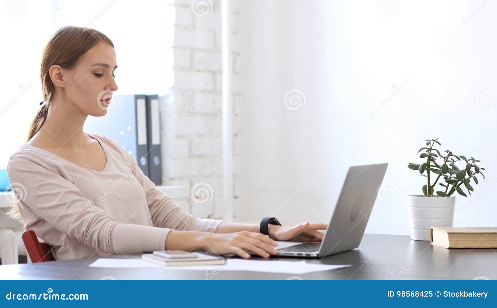 Woman Waiting in Office stock image. Image of desktop - 98568425