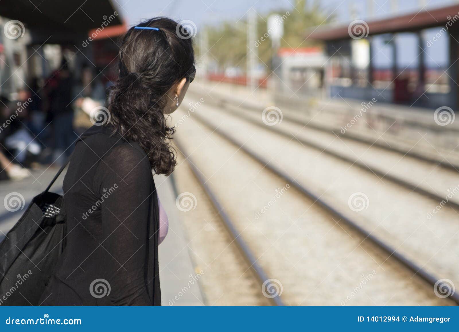 Lady Waiting For Train