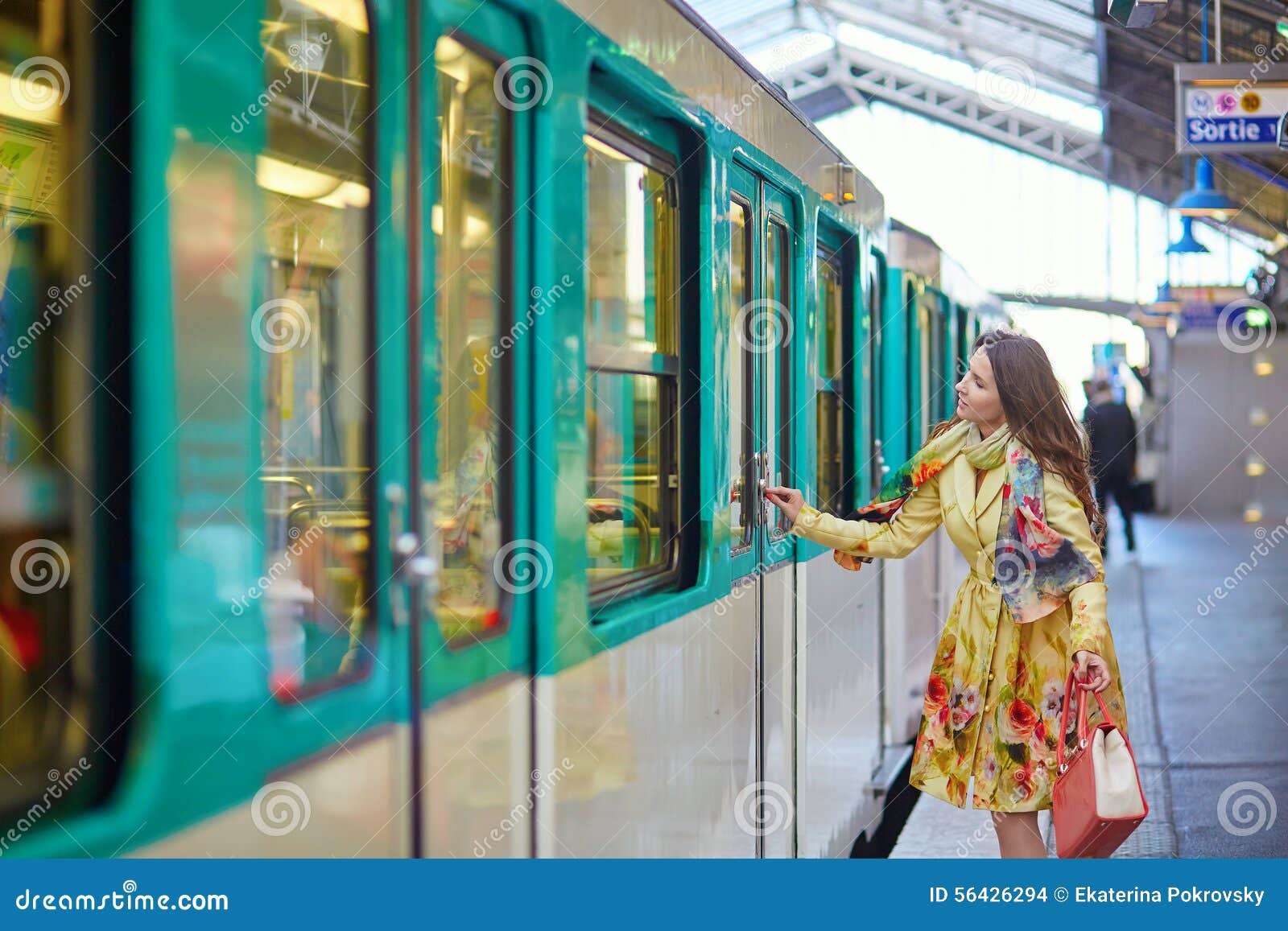 Woman waiting for a train stock photo. Image of platform - 56426294