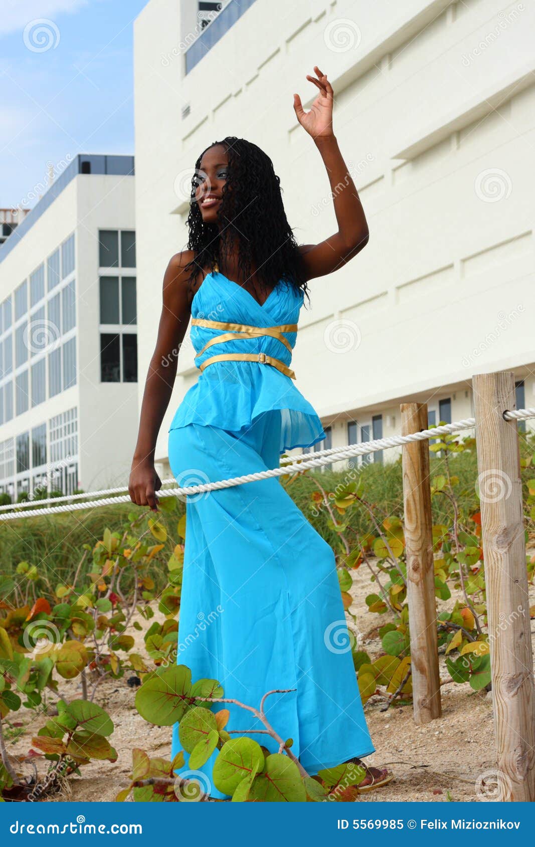 Woman Waiving stock image. Image of sand, blue, waive - 5569985