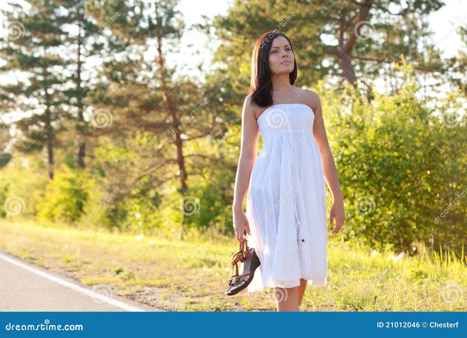 Woman Walking Along the Road Stock Photo - Image of summer, outdoor ...