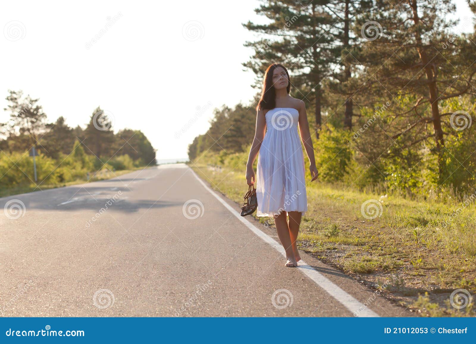 Woman Walking Along the Road Stock Image - Image of latino, rest: 21012053