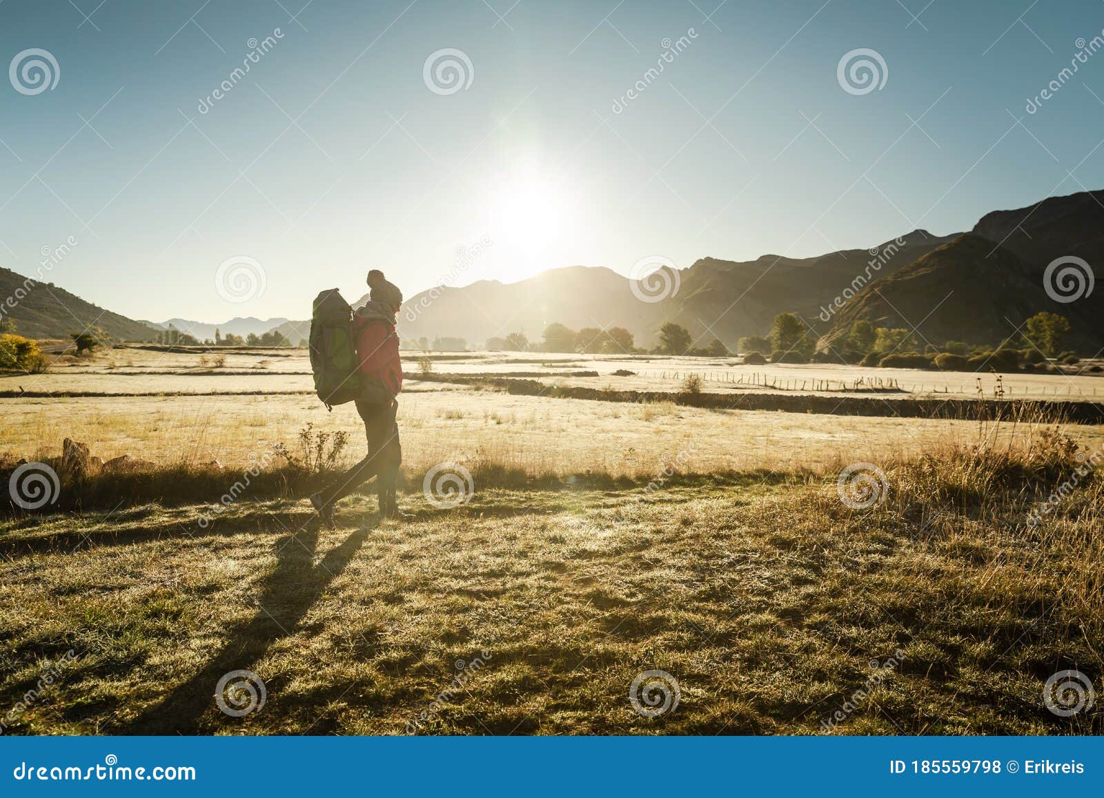 Woman Walking with a Backpack Stock Photo - Image of route, explorer ...