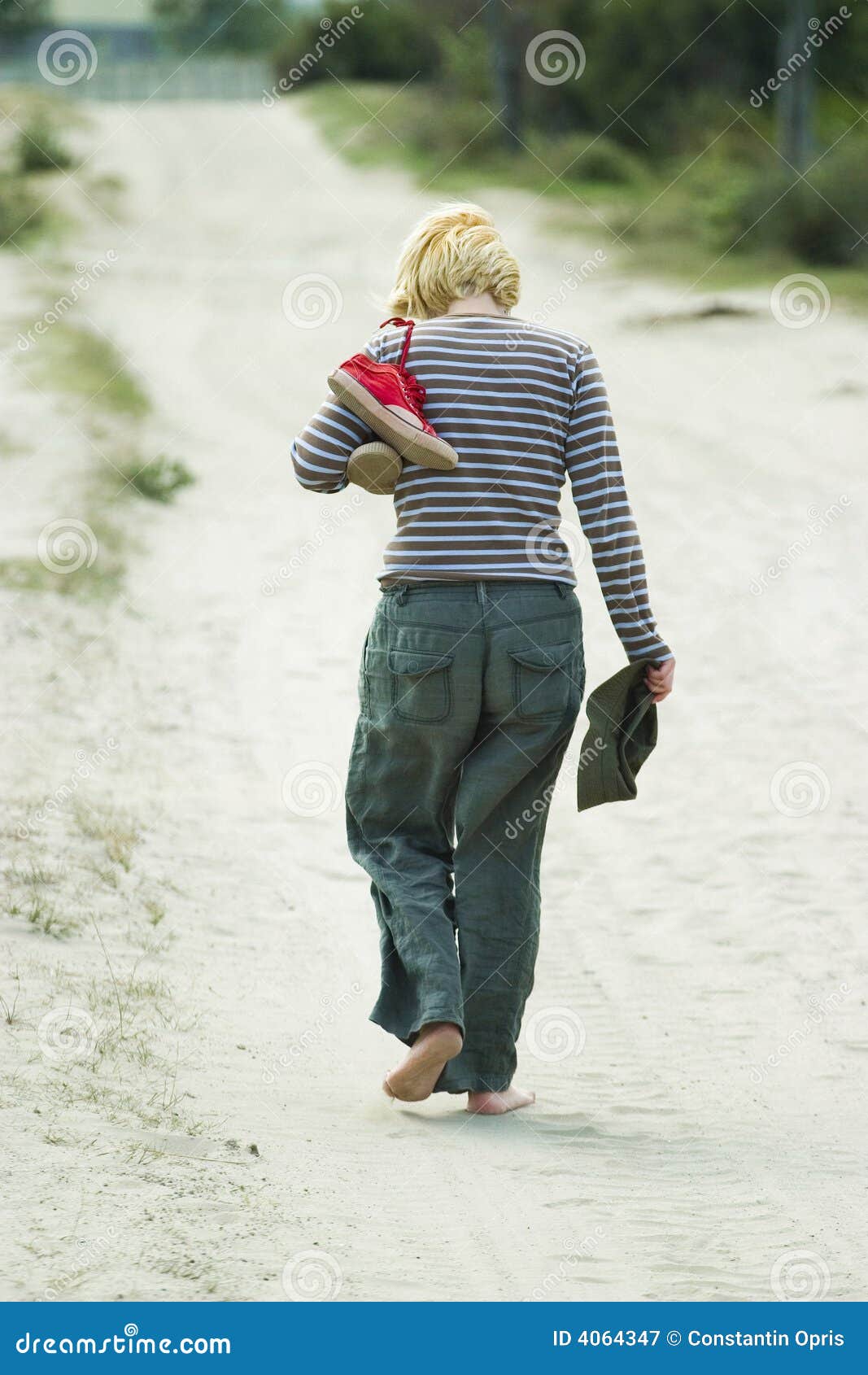 Woman walking barefoot stock image. Image of feet, pants - 4064347