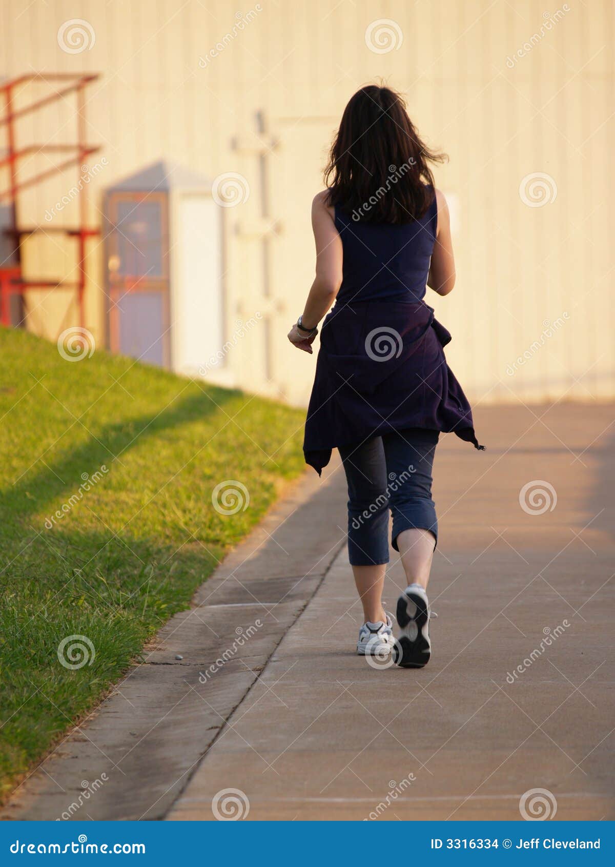 Woman Walking for Exercise stock photo. Image of sunshine - 3316334
