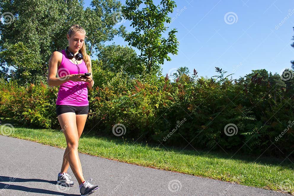 Woman walking for exercise stock image. Image of walk - 34930403