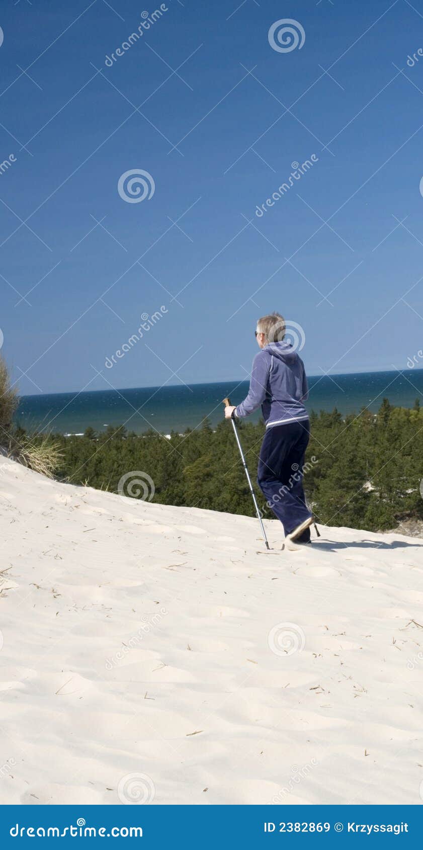 Woman walking in sand stock image. Image of beach, outside - 2382869