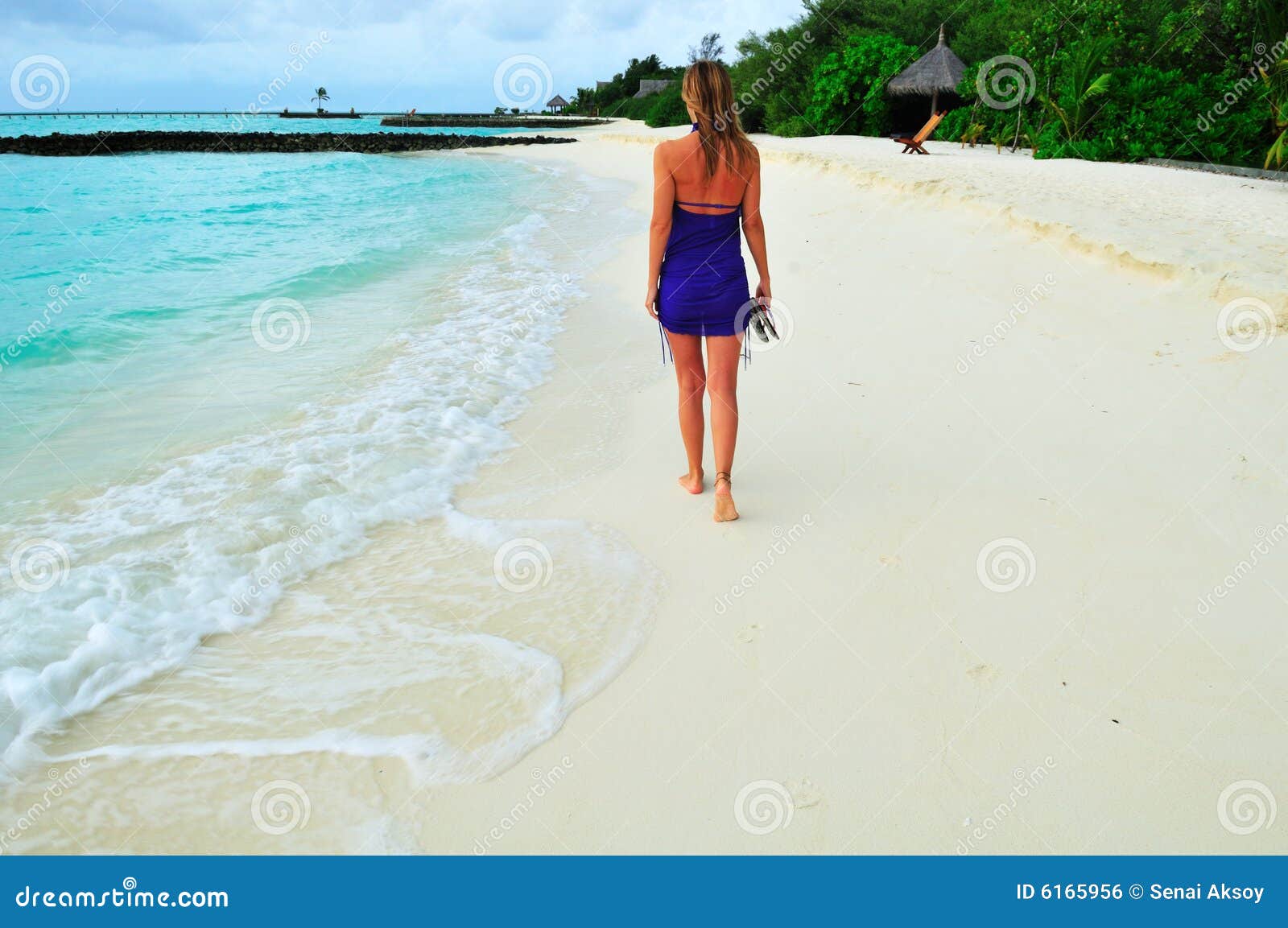 Woman Walking on the Sandy Beach Stock Photo - Image of suit, leisure ...