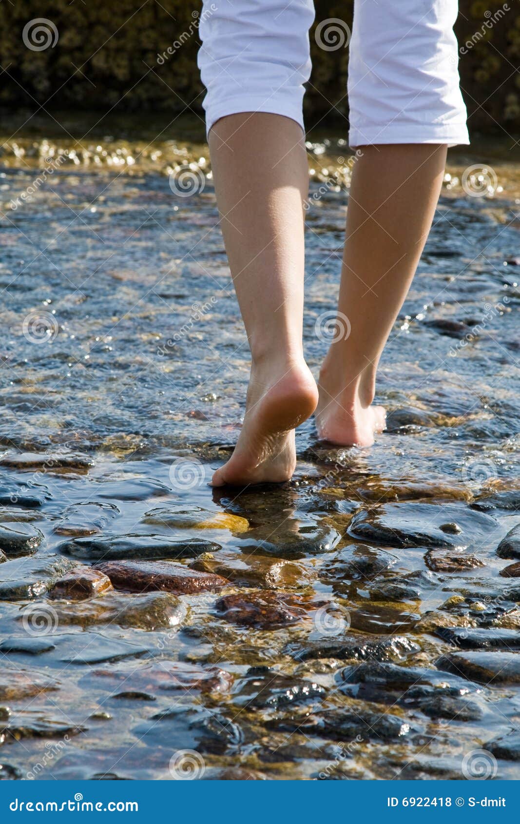 Woman Walking on the Stones Stock Photo - Image of steps, beach: 6922418