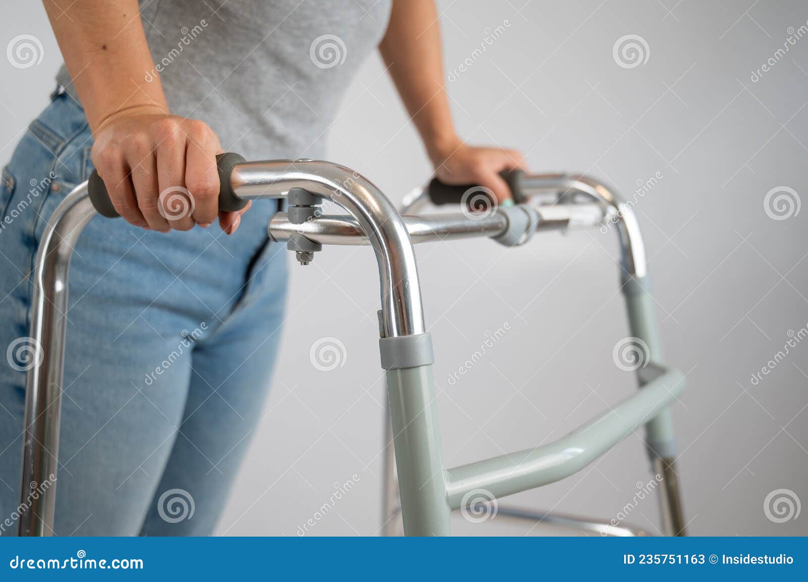 A Woman is Walking with a Walker on a White Background Stock Image ...