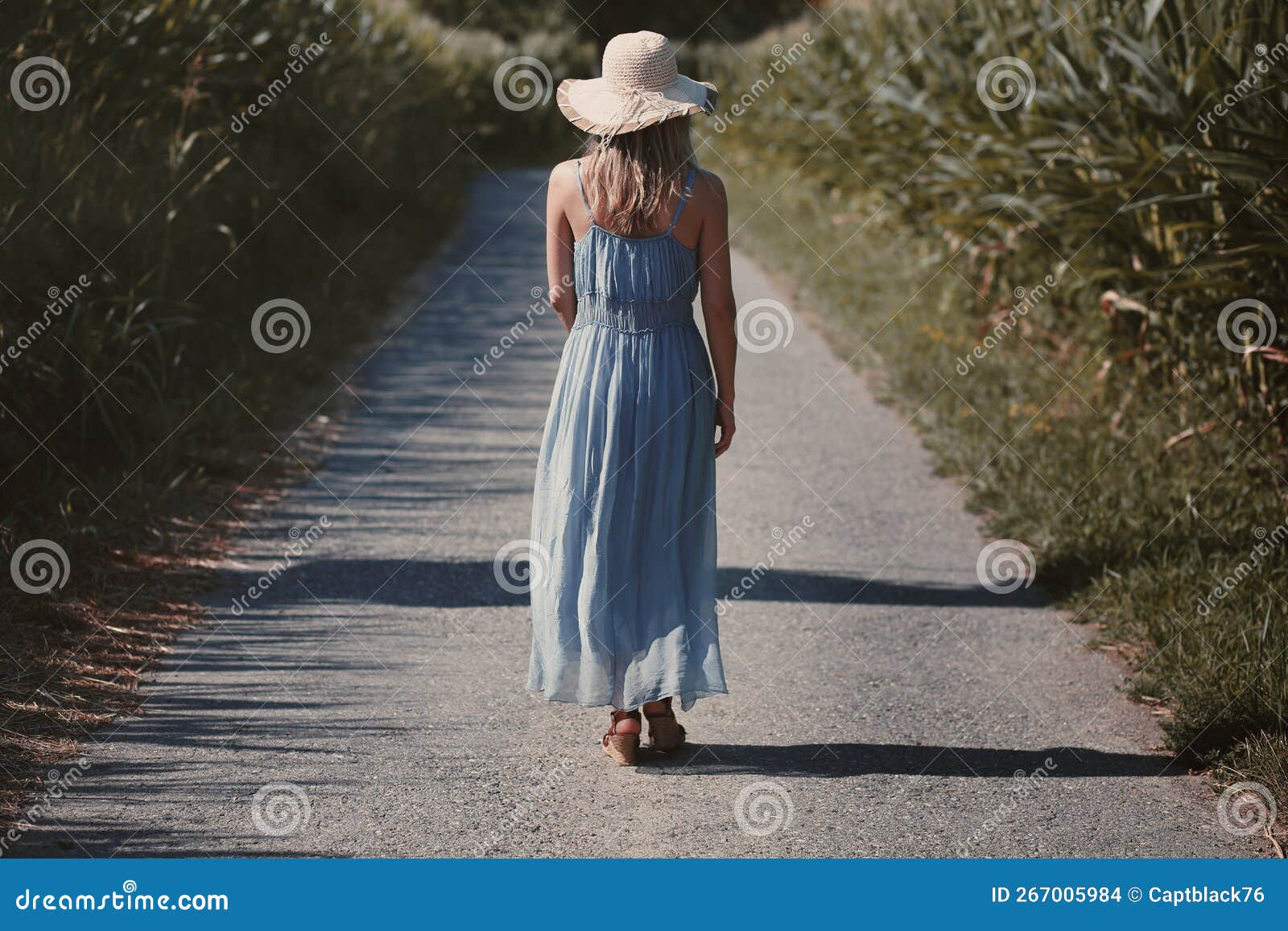 Woman Walks in Country Road Stock Photo - Image of summer, emotive ...
