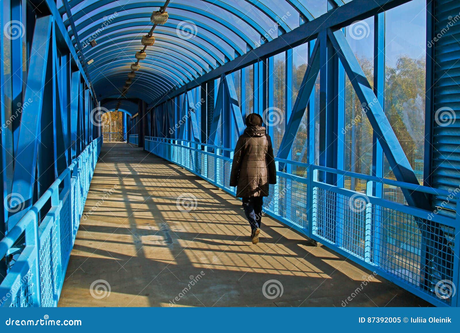 A Woman Walks on a Overhead Pedestrian Bridge Editorial Image - Image ...