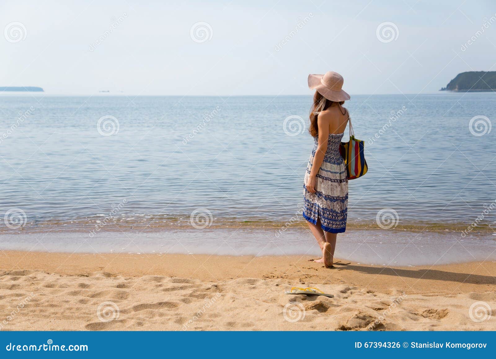Woman Walks into the Sea on the Beach Stock Photo - Image of ocean ...