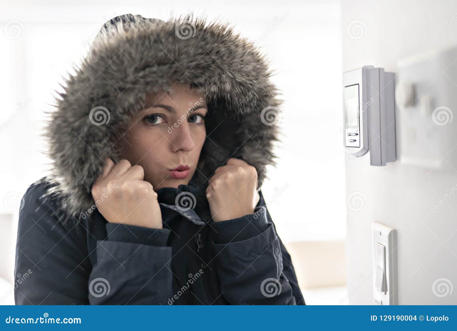 Woman with Warm Clothing Feeling the Cold Inside House Stock Photo ...
