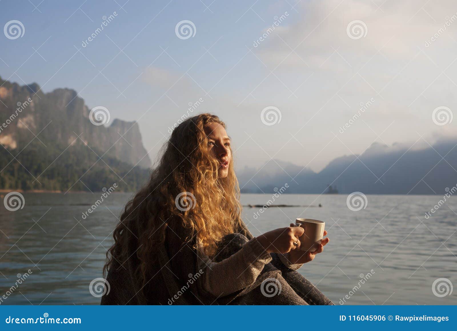 Woman Warm in the Morning Sun Stock Photo - Image of lake, cold: 116045906