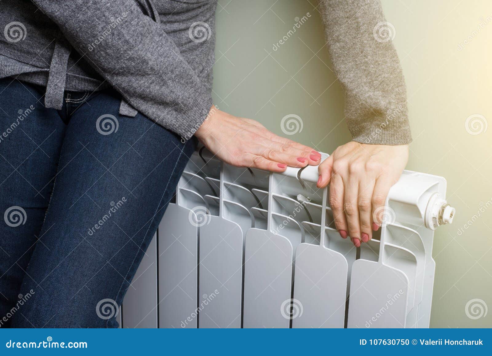 Woman Warming Her Hands on the Radiator Panel Stock Photo - Image of ...