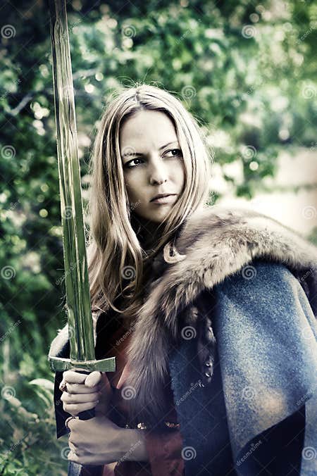 Woman warrior with sword stock image. Image of blond - 26321073