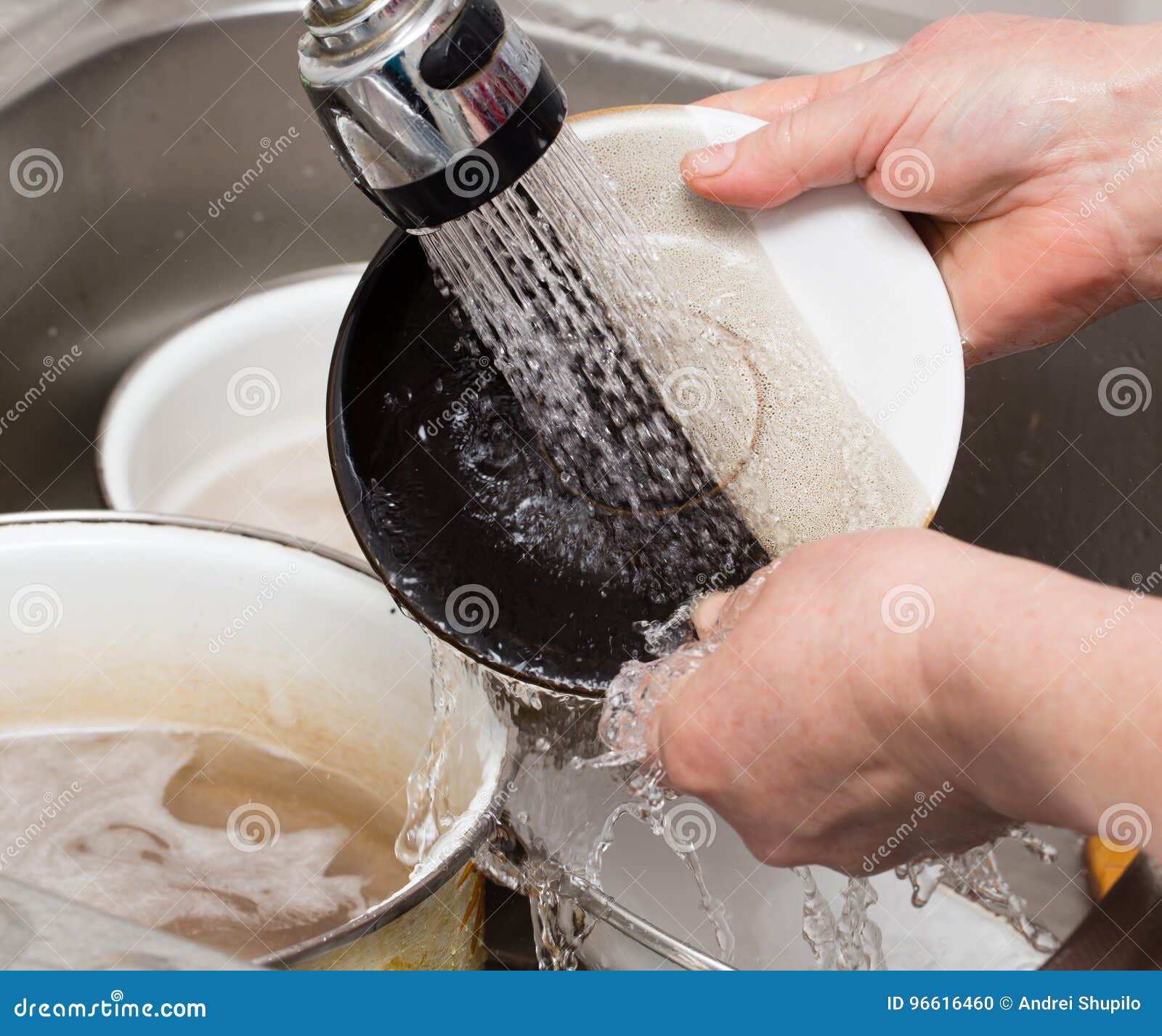 Woman Washes Spoons Under a Tap of Water Stock Photo - Image of hands ...