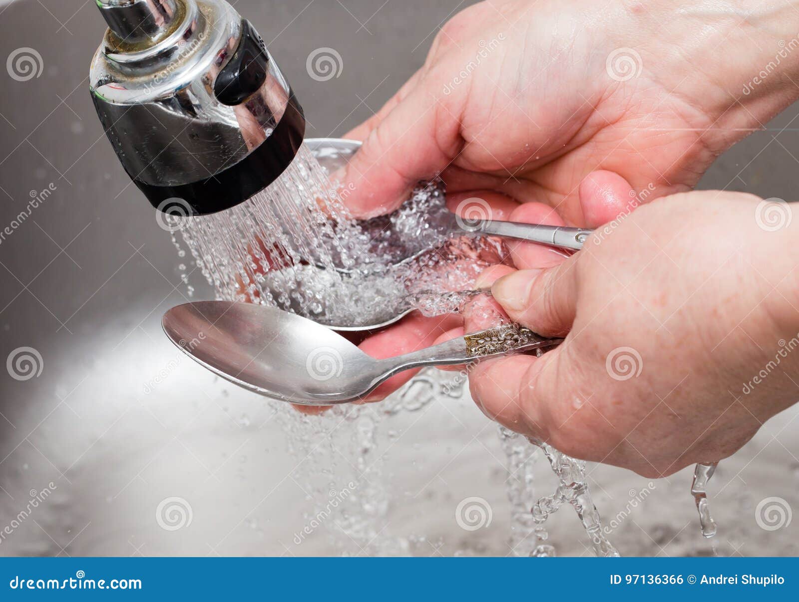 Woman Washes Spoons Under a Tap of Water Stock Photo - Image of ...