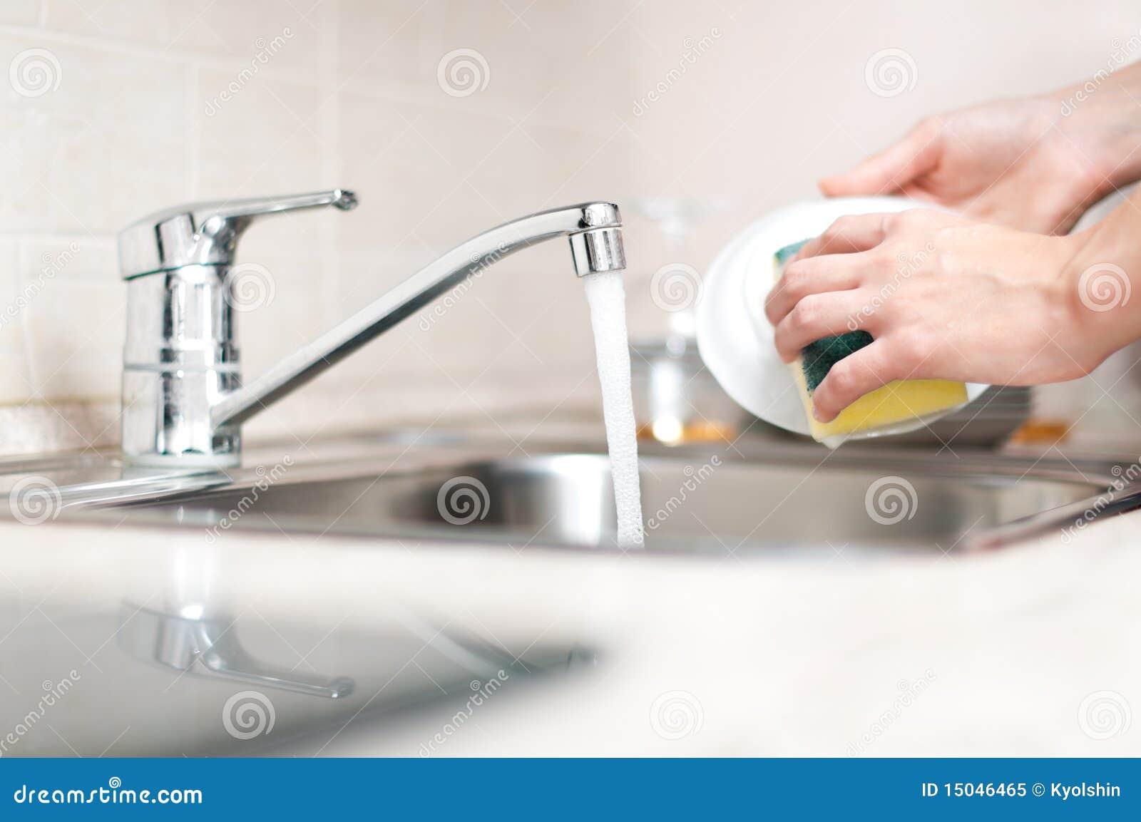 Woman washing dishes stock image. Image of kitchen, light - 15046465