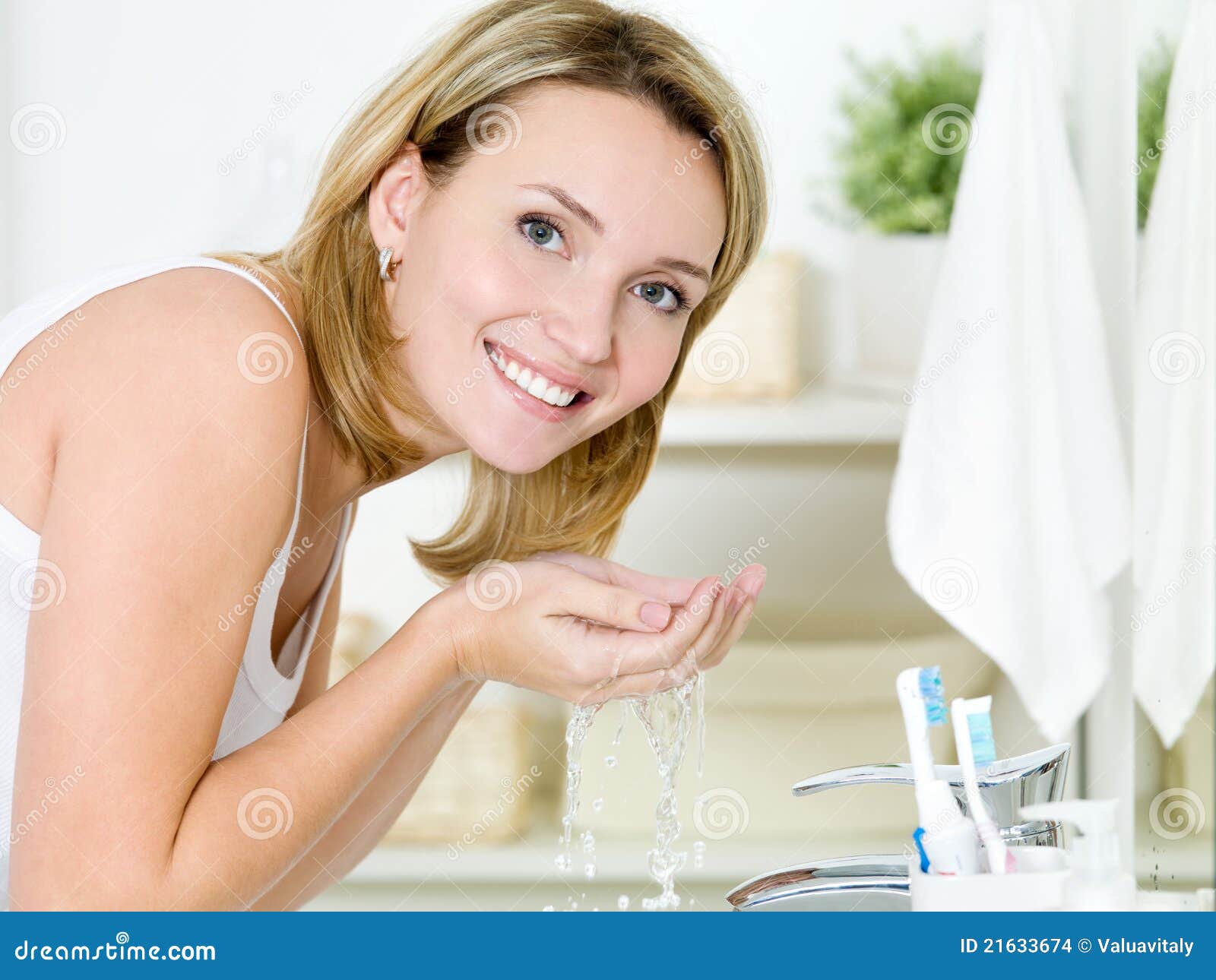 Woman Washing Face with Water Stock Photo - Image of hygiene, indoors ...